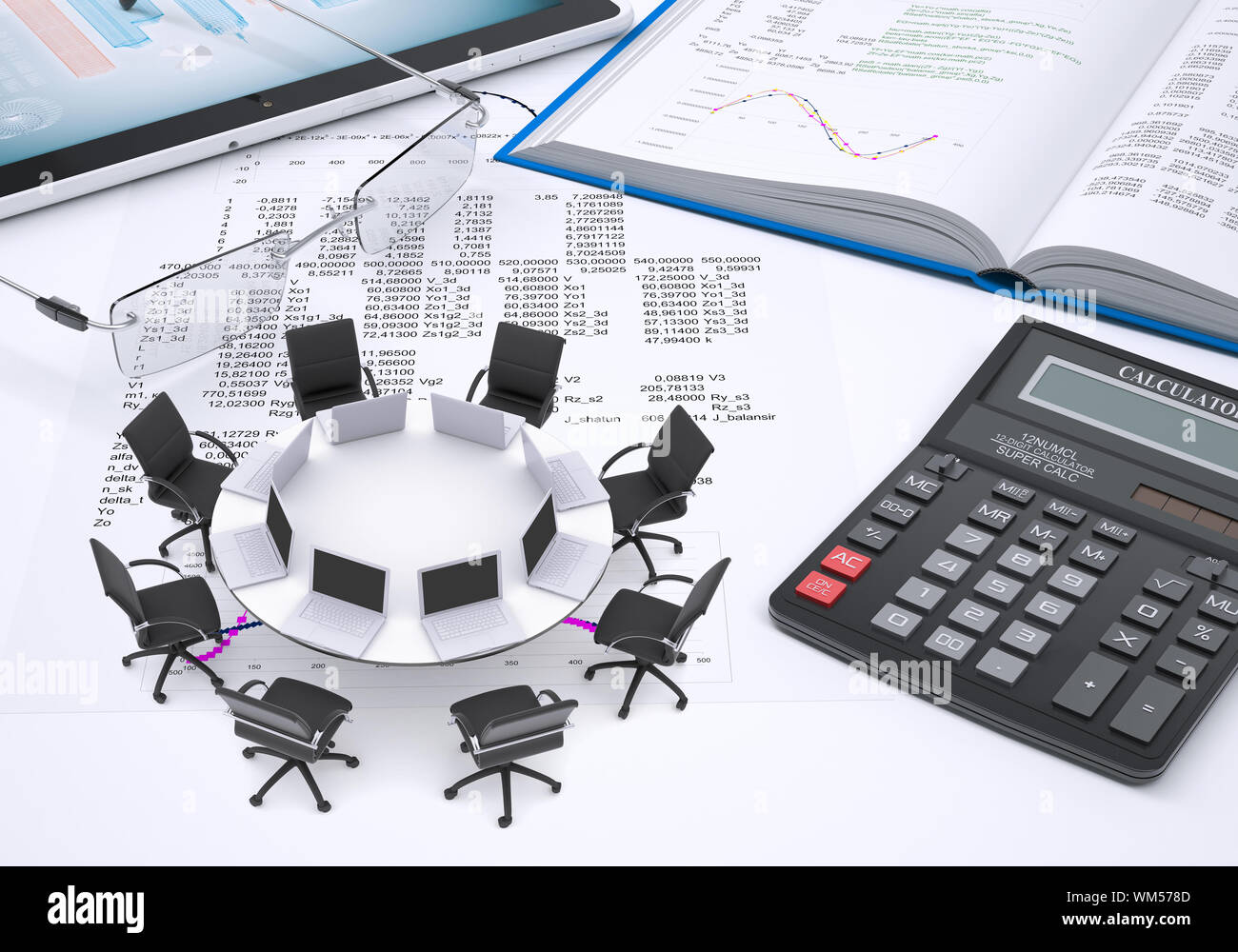 Miniature round table with chairs placed on tablet pc, book, calculator ...