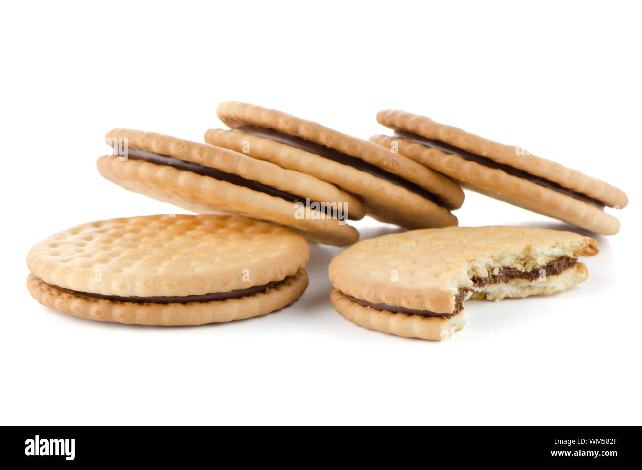 Sandwich biscuits with chocolate filling on a white background Stock ...