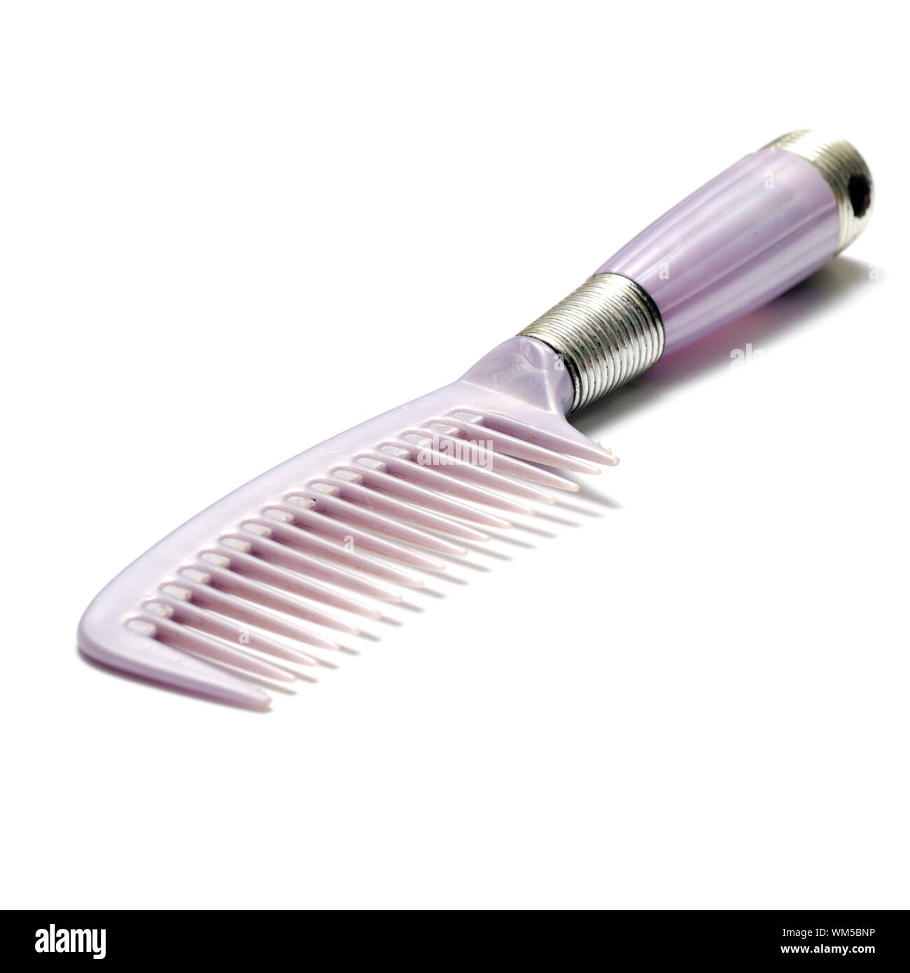 used comb on white background Stock Photo - Alamy