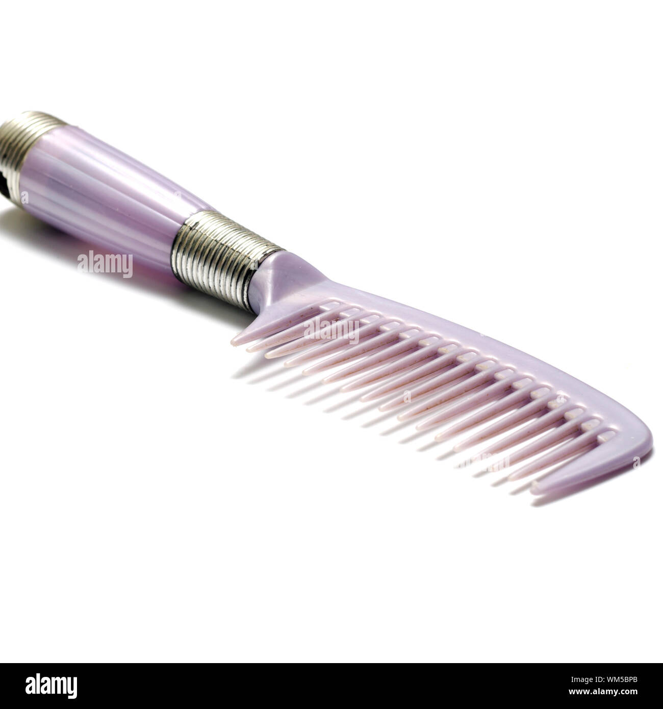 used comb on white background Stock Photo - Alamy