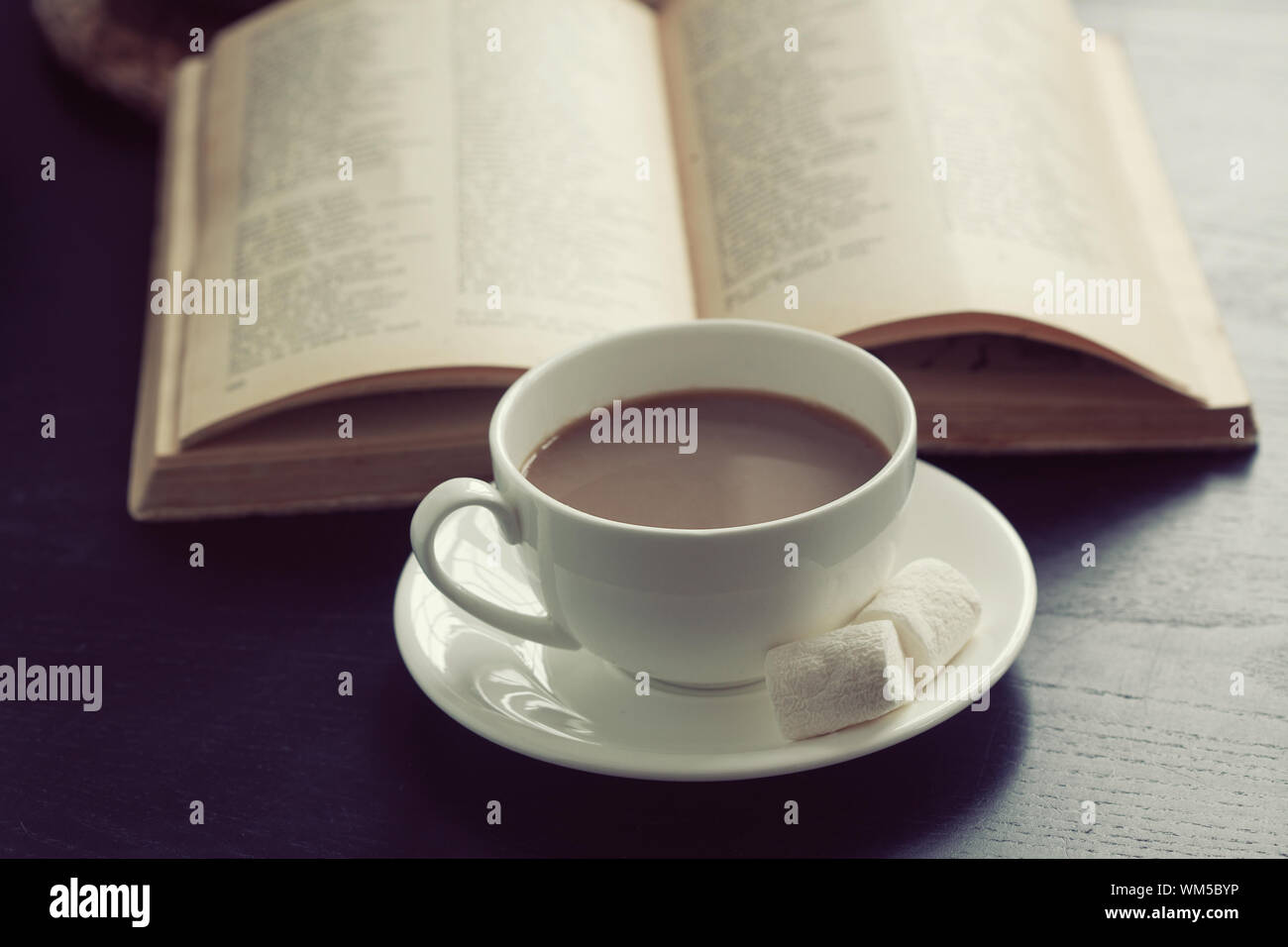 Coffee and book Stock Photo - Alamy