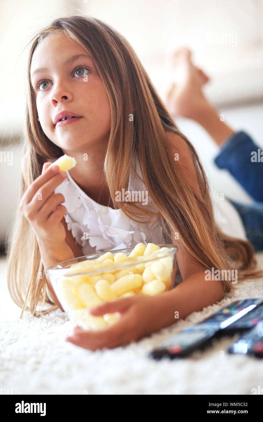 Child watching tv Stock Photo - Alamy