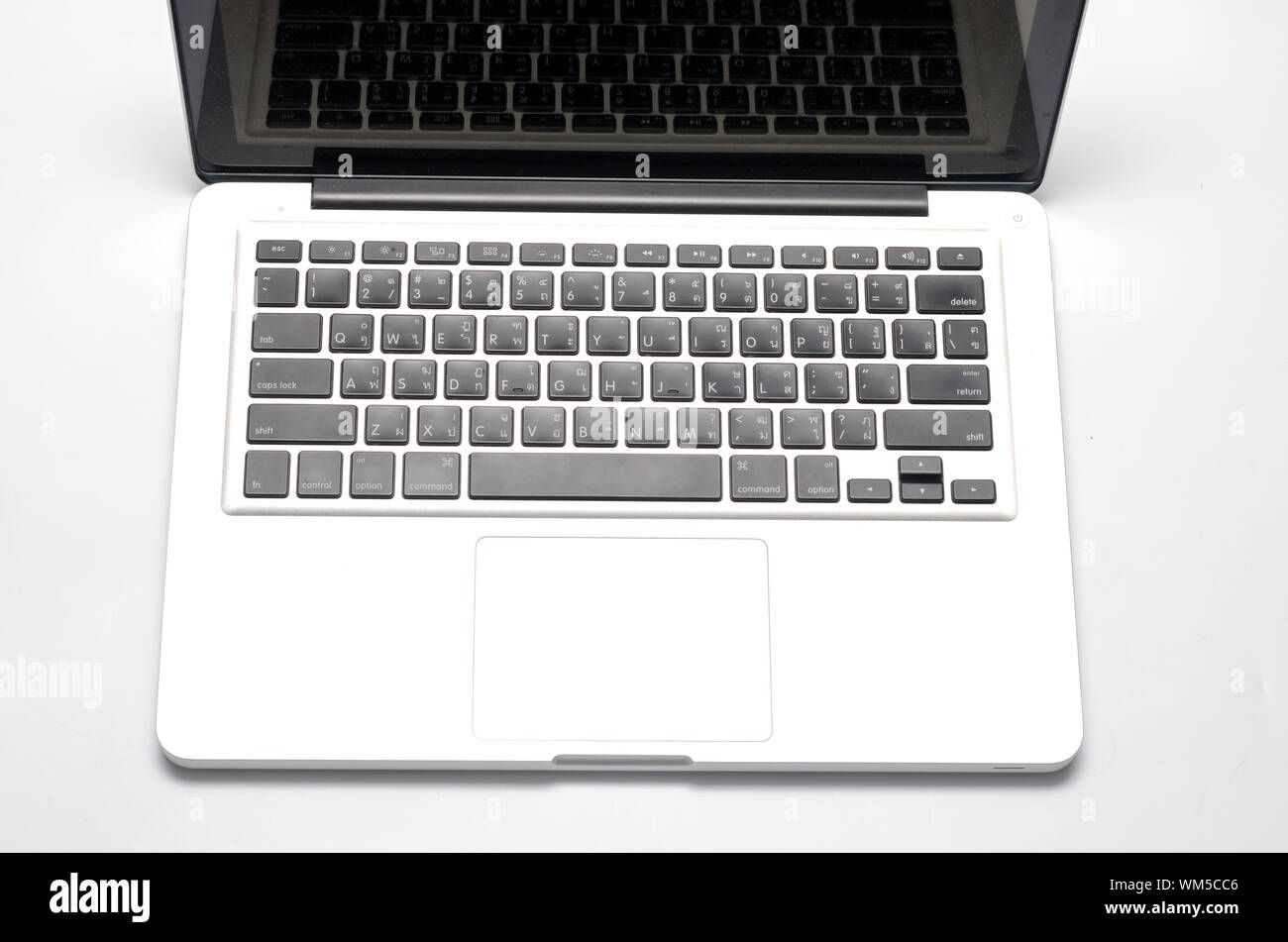 closeup laptop keyboard on white background Stock Photo - Alamy