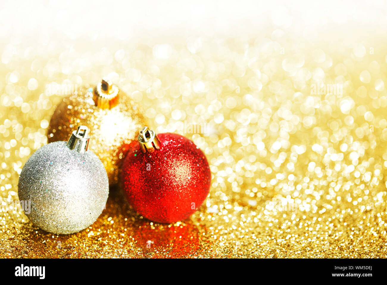 Colorful christmas balls on shining glitter background close-up Stock ...