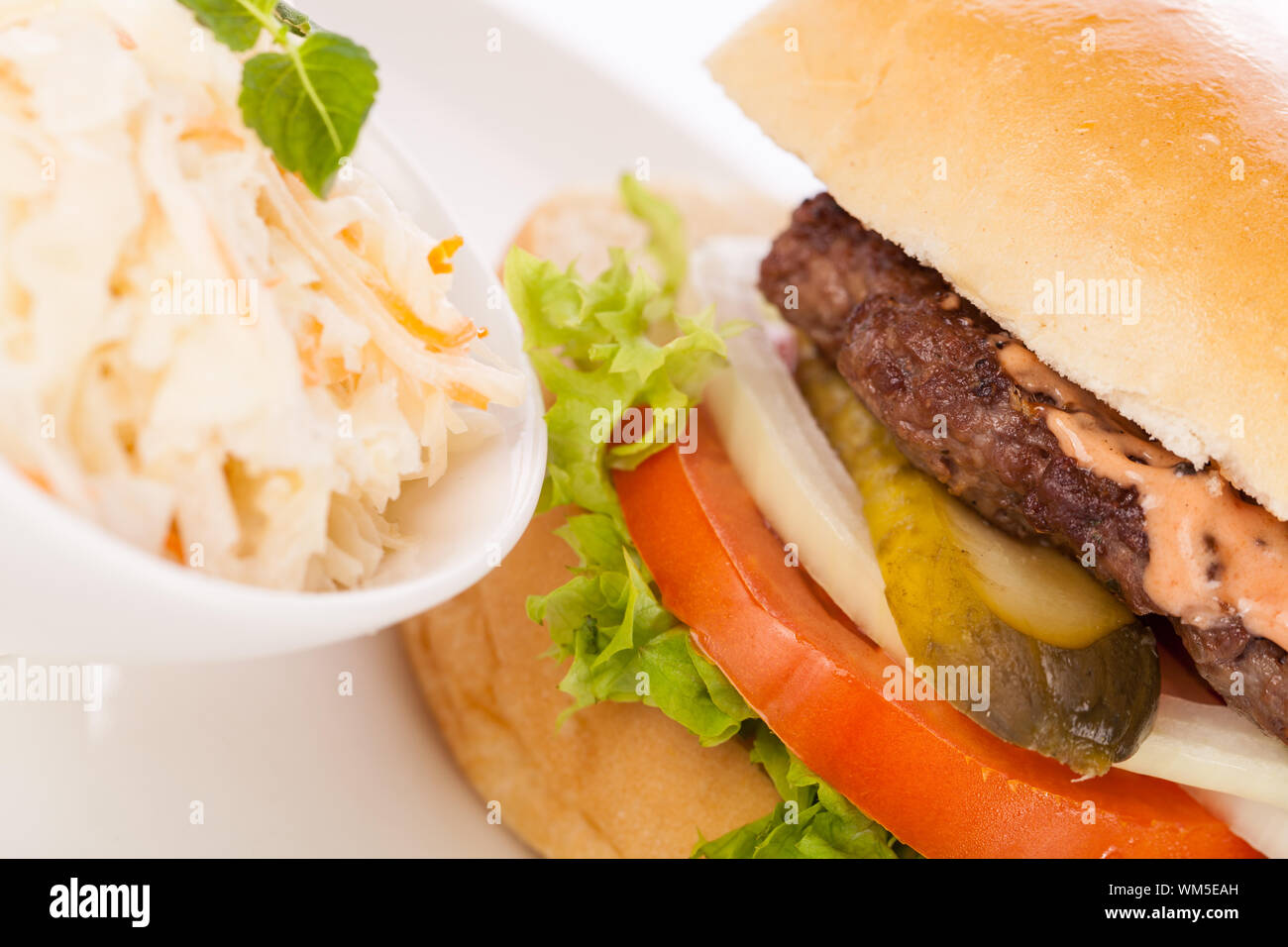 Cheeseburger with cole slaw Stock Photo - Alamy