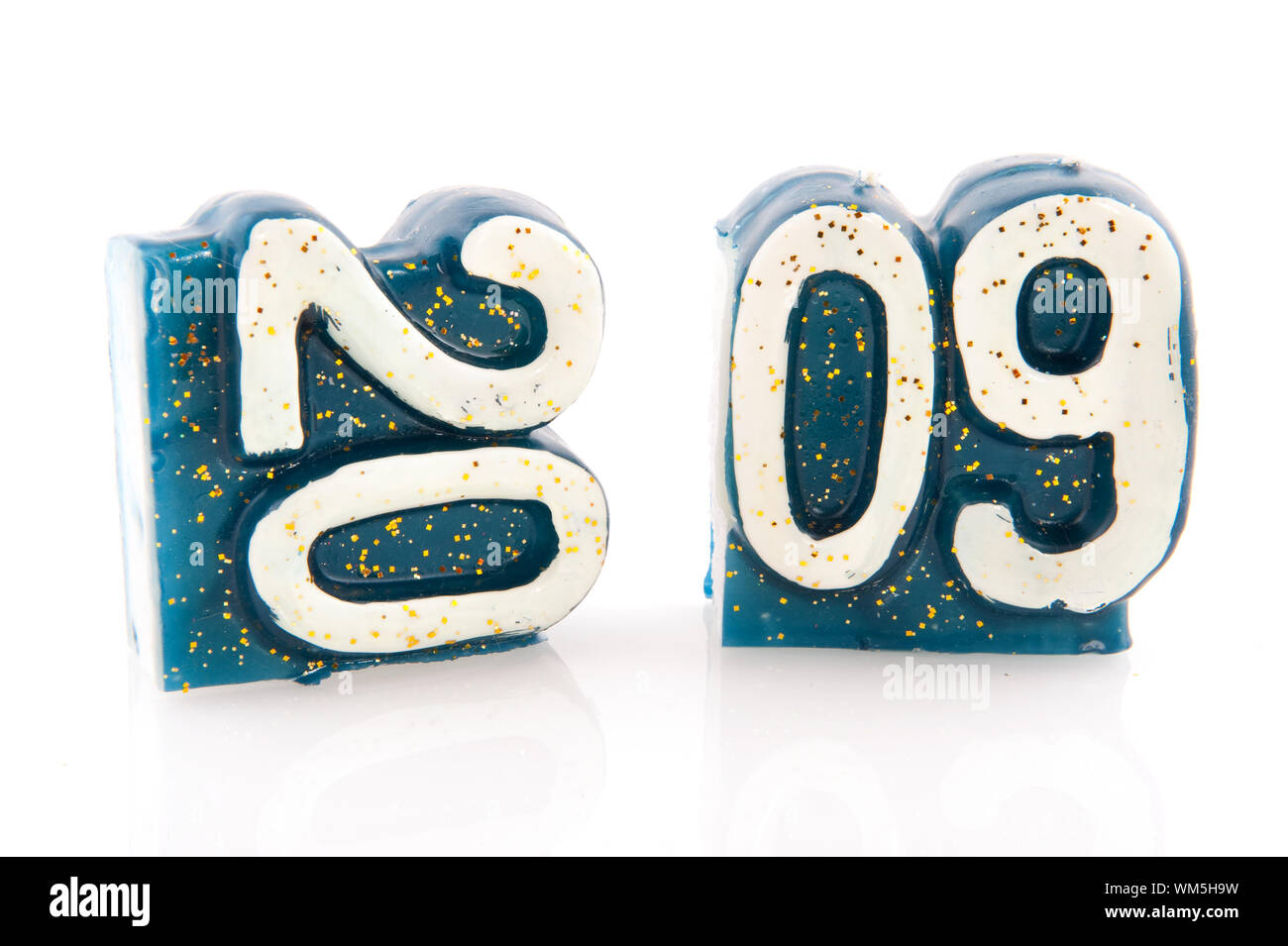 Finished 2009 with broken numbers isolated over white Stock Photo - Alamy