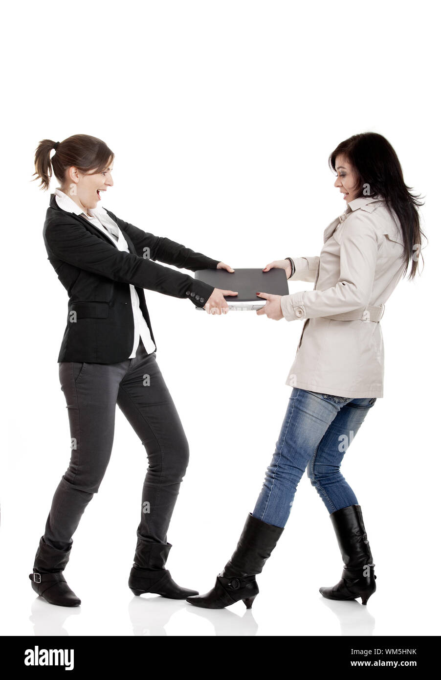 Two young women Fighting for a laptop, isolated on white Stock Photo ...