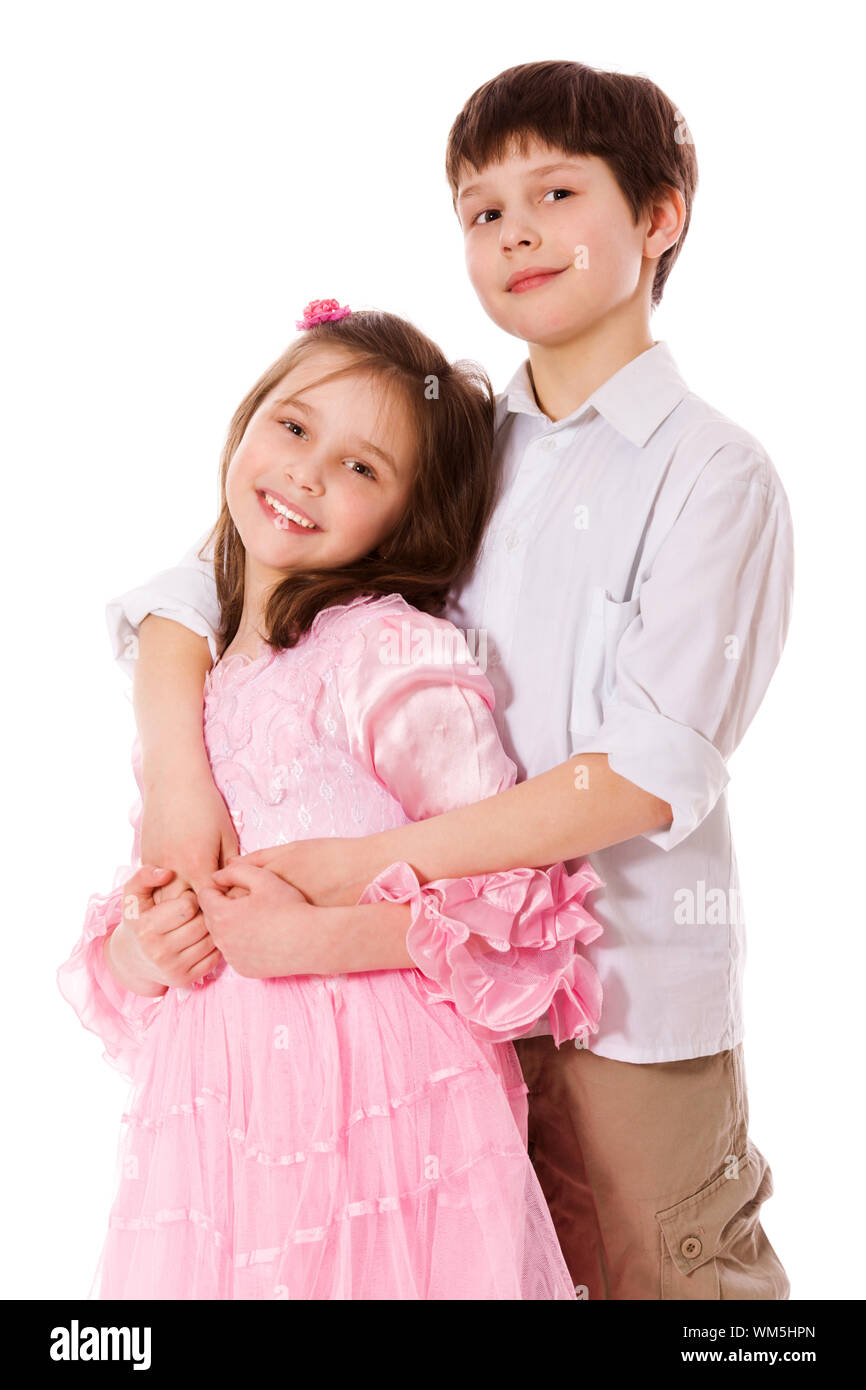 brother and sister posing together isolated on white Stock Photo - Alamy