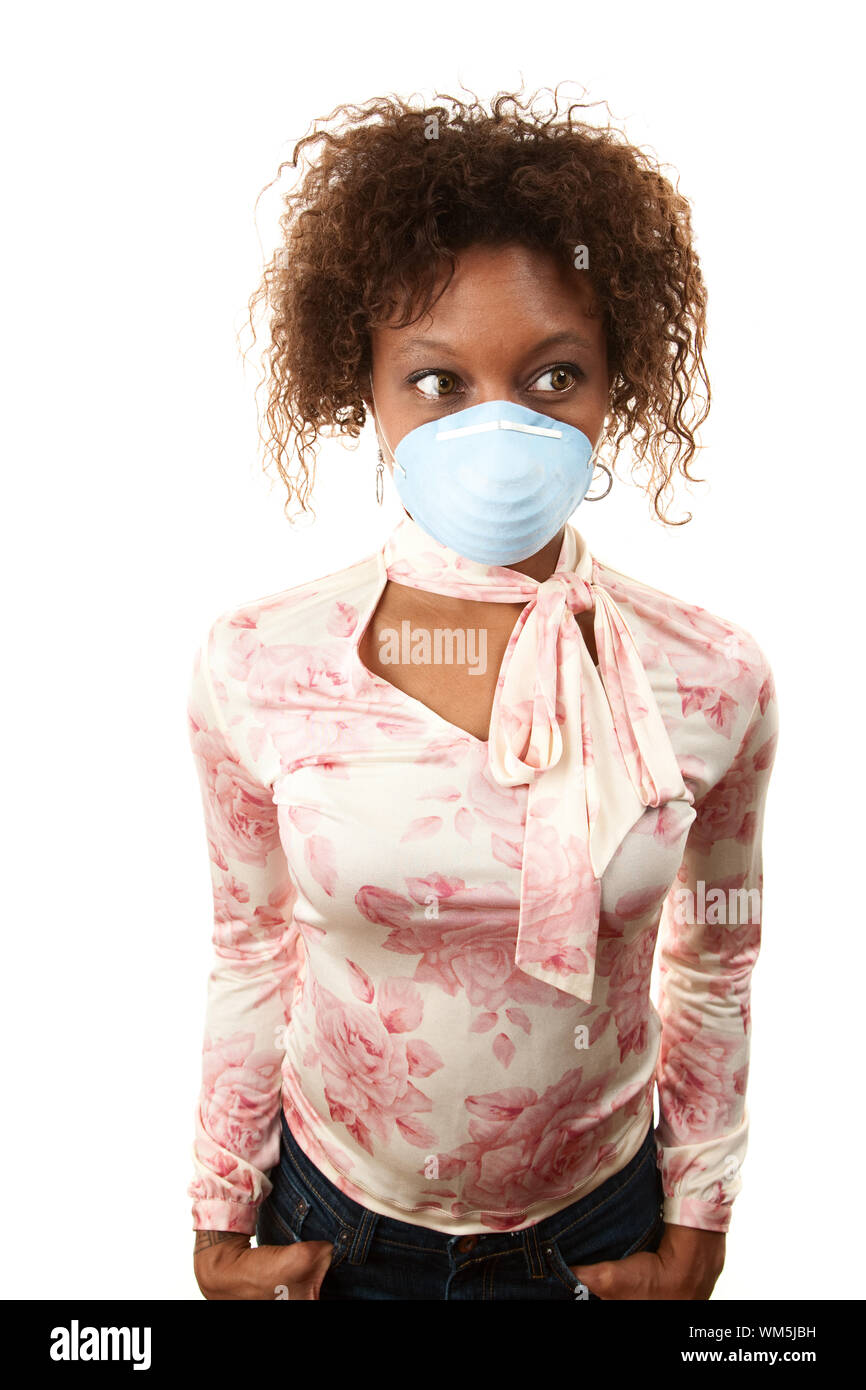 Pretty African-American woman with breathing mask to protect of germs ...