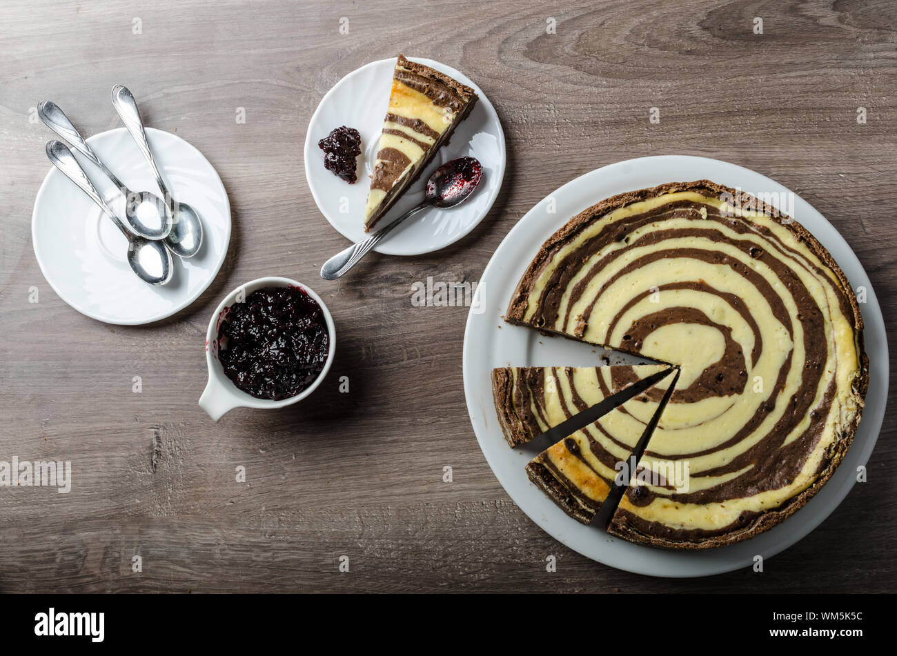 Two-tone cheesecake with homemade cherry jam, homamade Stock Photo - Alamy