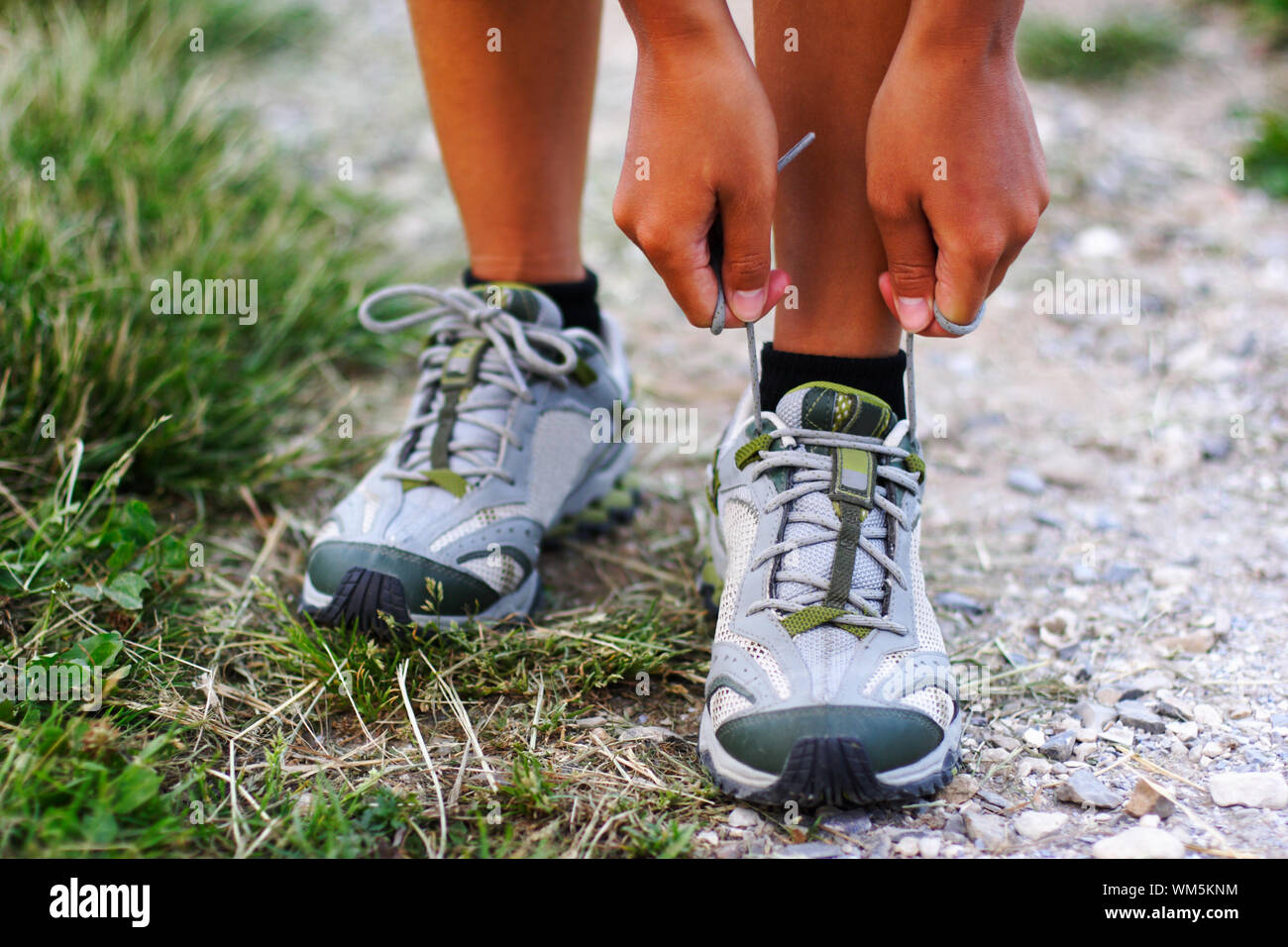 Tied laces running shoes hi-res stock photography and images - Alamy