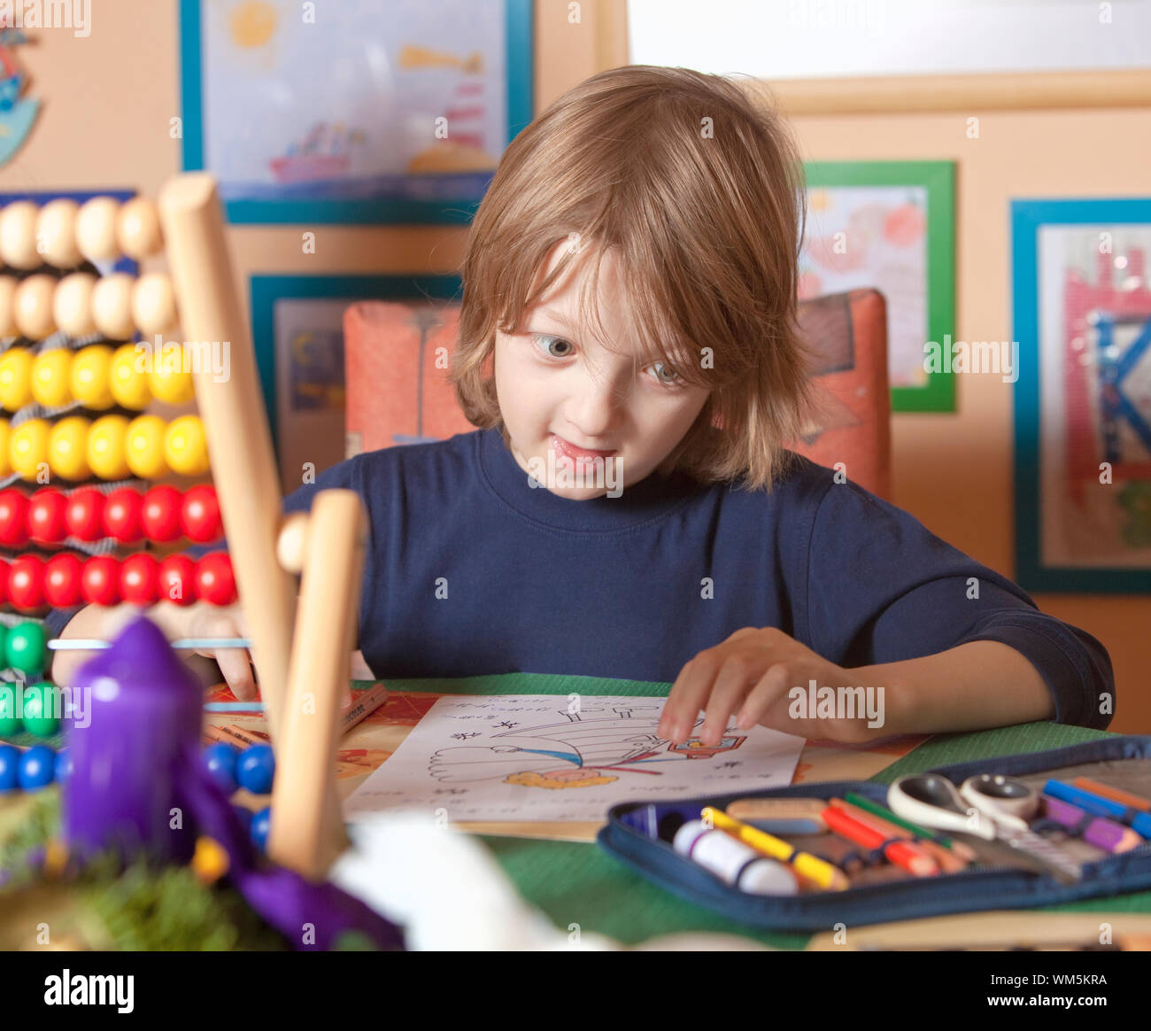 Boy working on his homework hi-res stock photography and images - Alamy