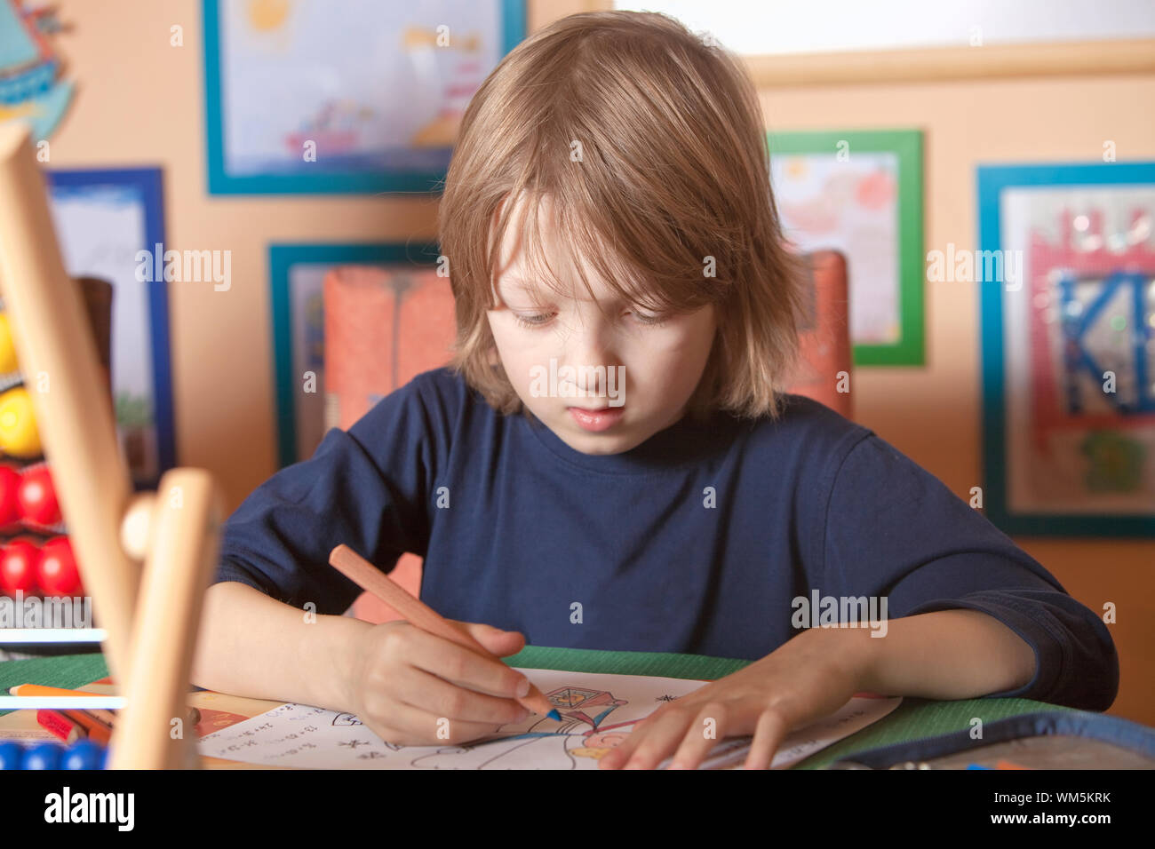Boy working on his homework hi-res stock photography and images - Alamy