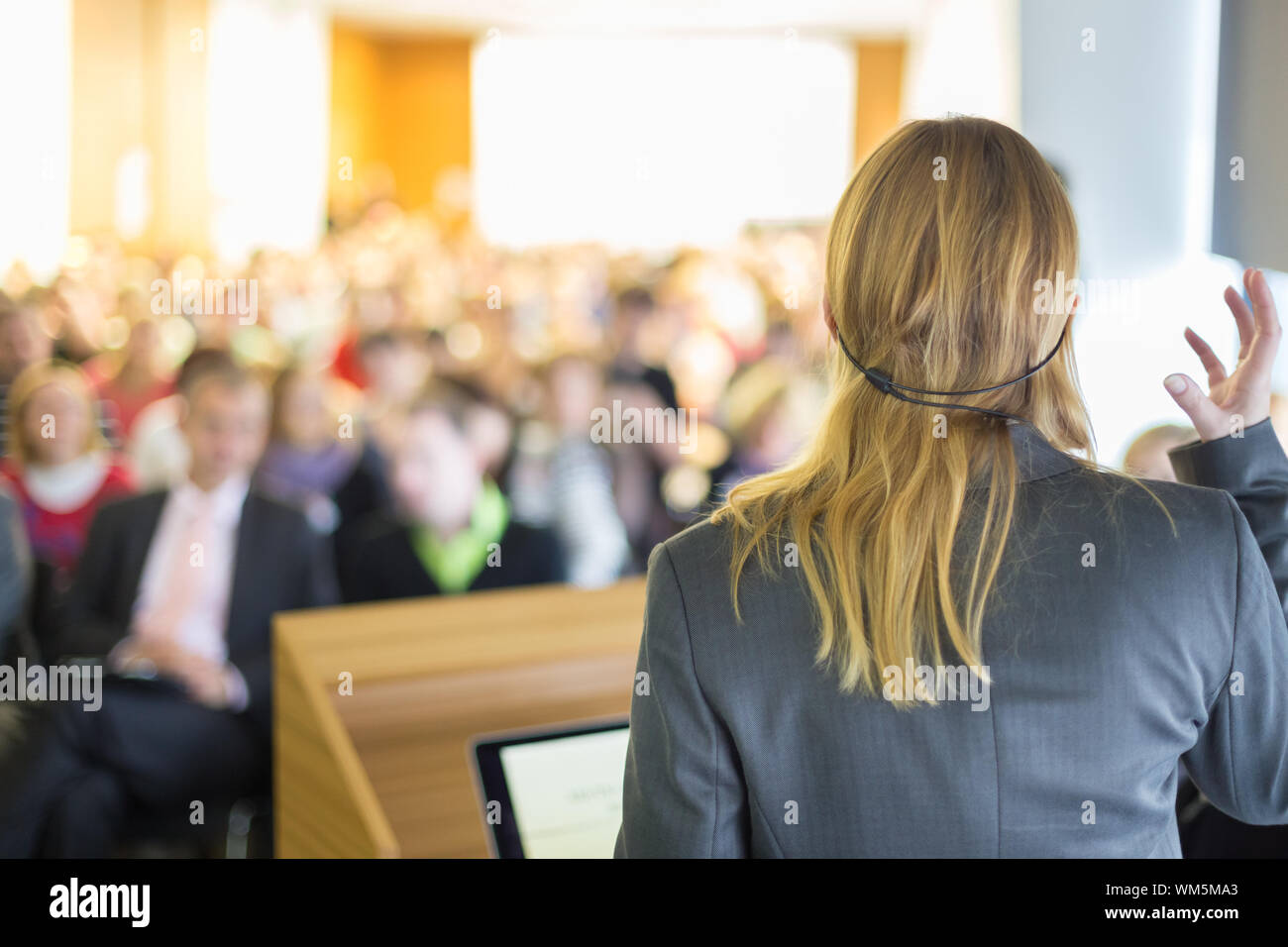 Female speaker at Business Conference and Presentation. Audience at the ...