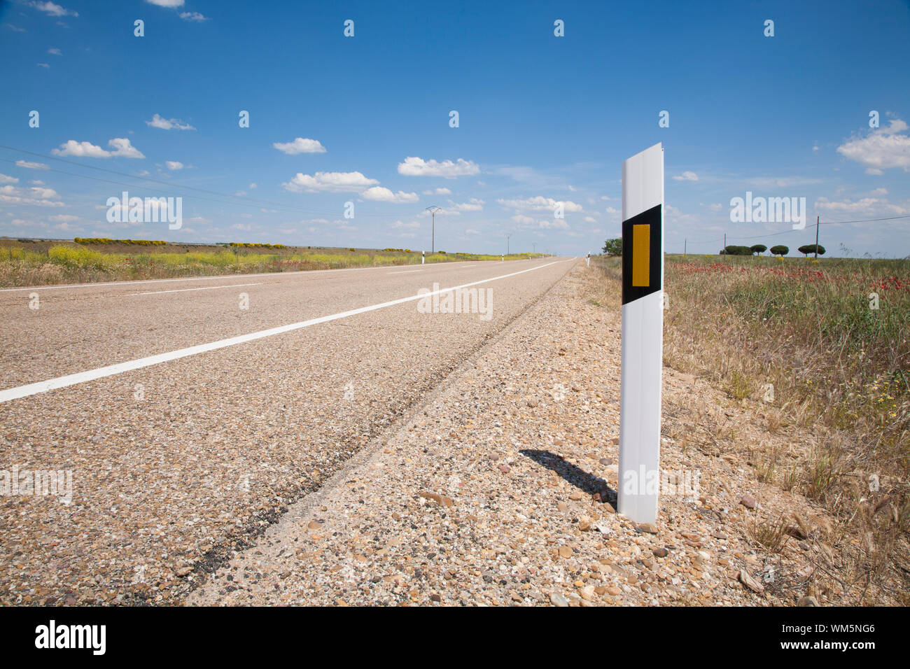 reflector signal white post roadside in lonely road of Spain Europe ...