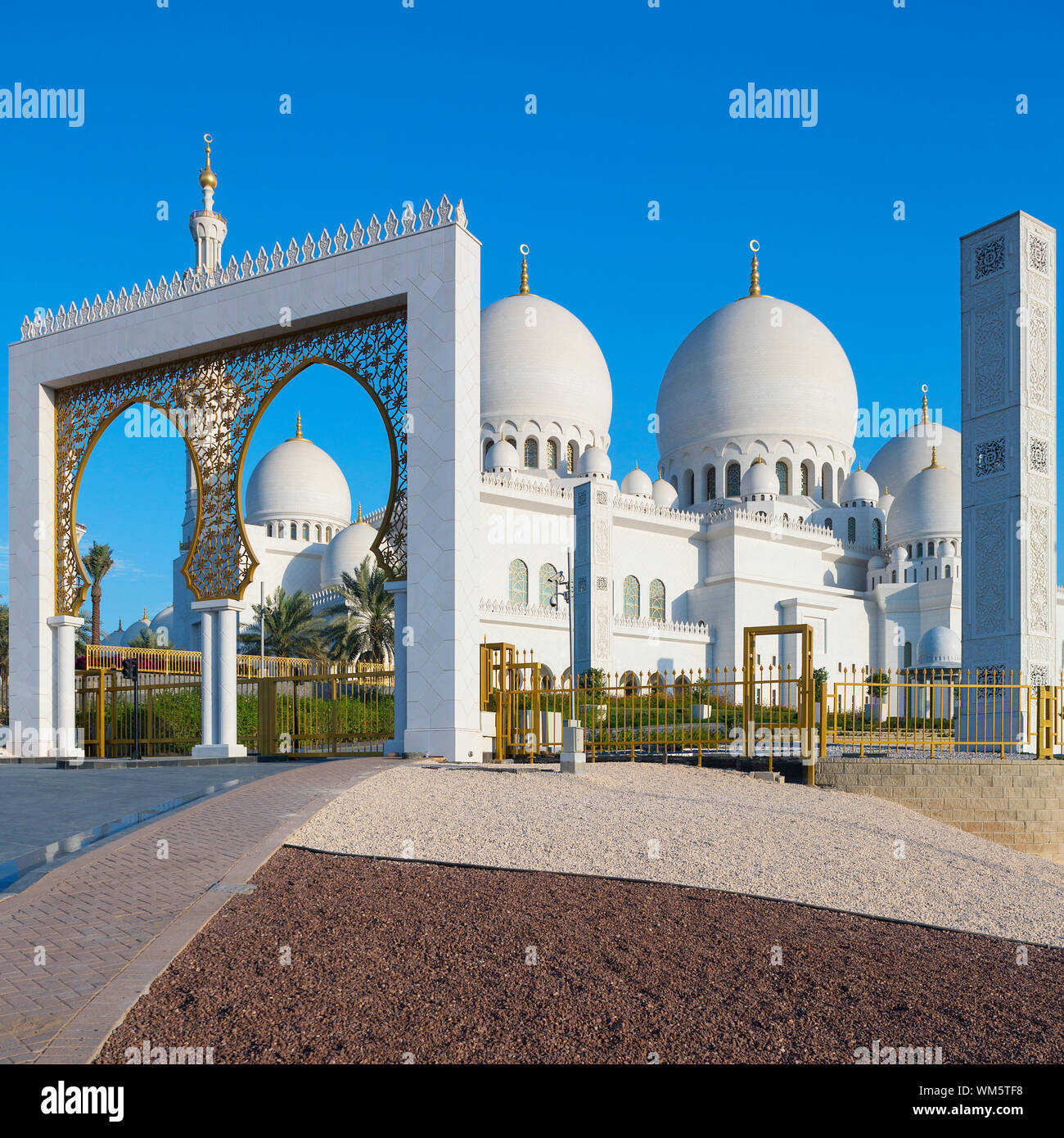 Entry of Sheikh Zayed Grand Mosque with blue sky, UAE Stock Photo - Alamy