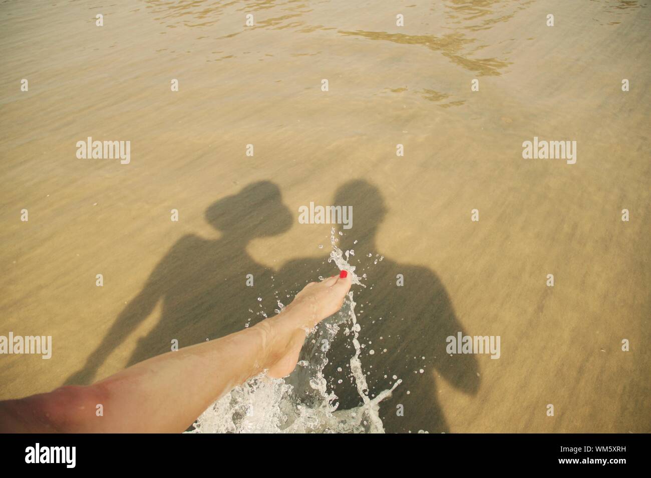 Couple Shadows Beach High Resolution Stock Photography and Images - Alamy