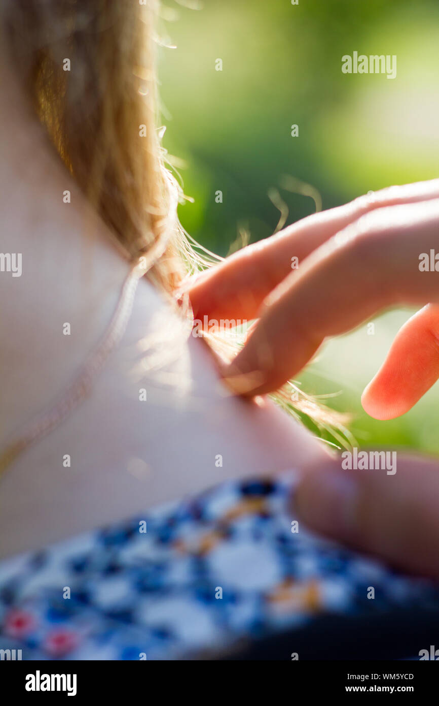 Hand neck close up hi-res stock photography and images - Alamy