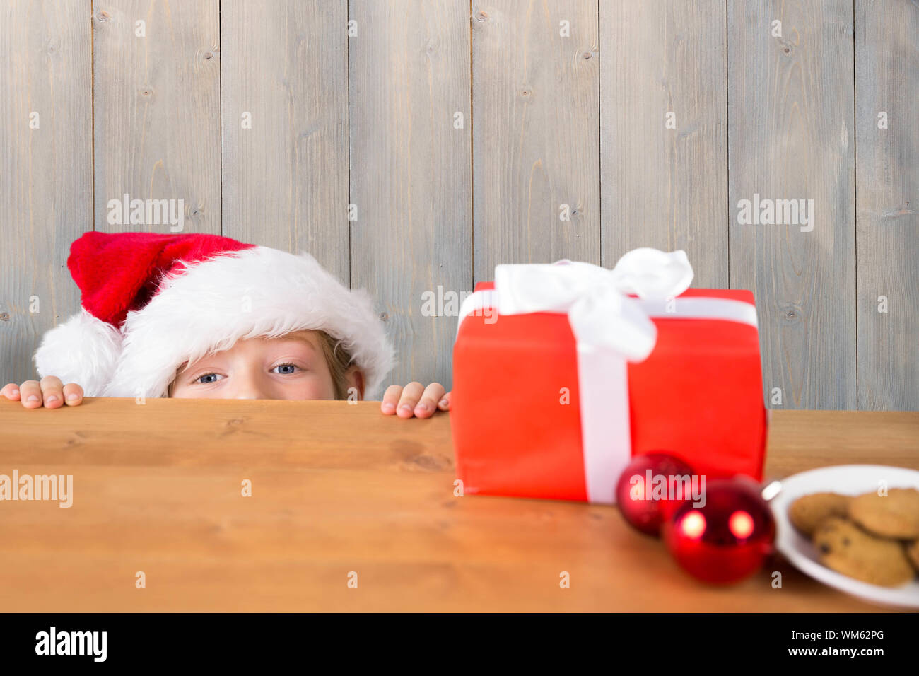 Boy peeking table hi-res stock photography and images - Alamy