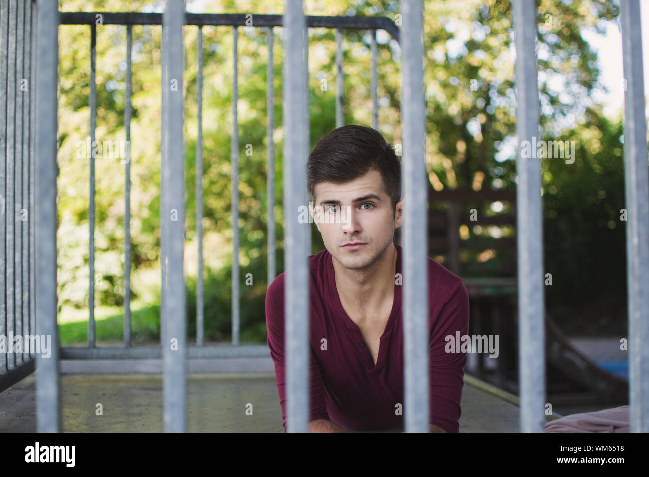 Man in the cage hi-res stock photography and images - Alamy