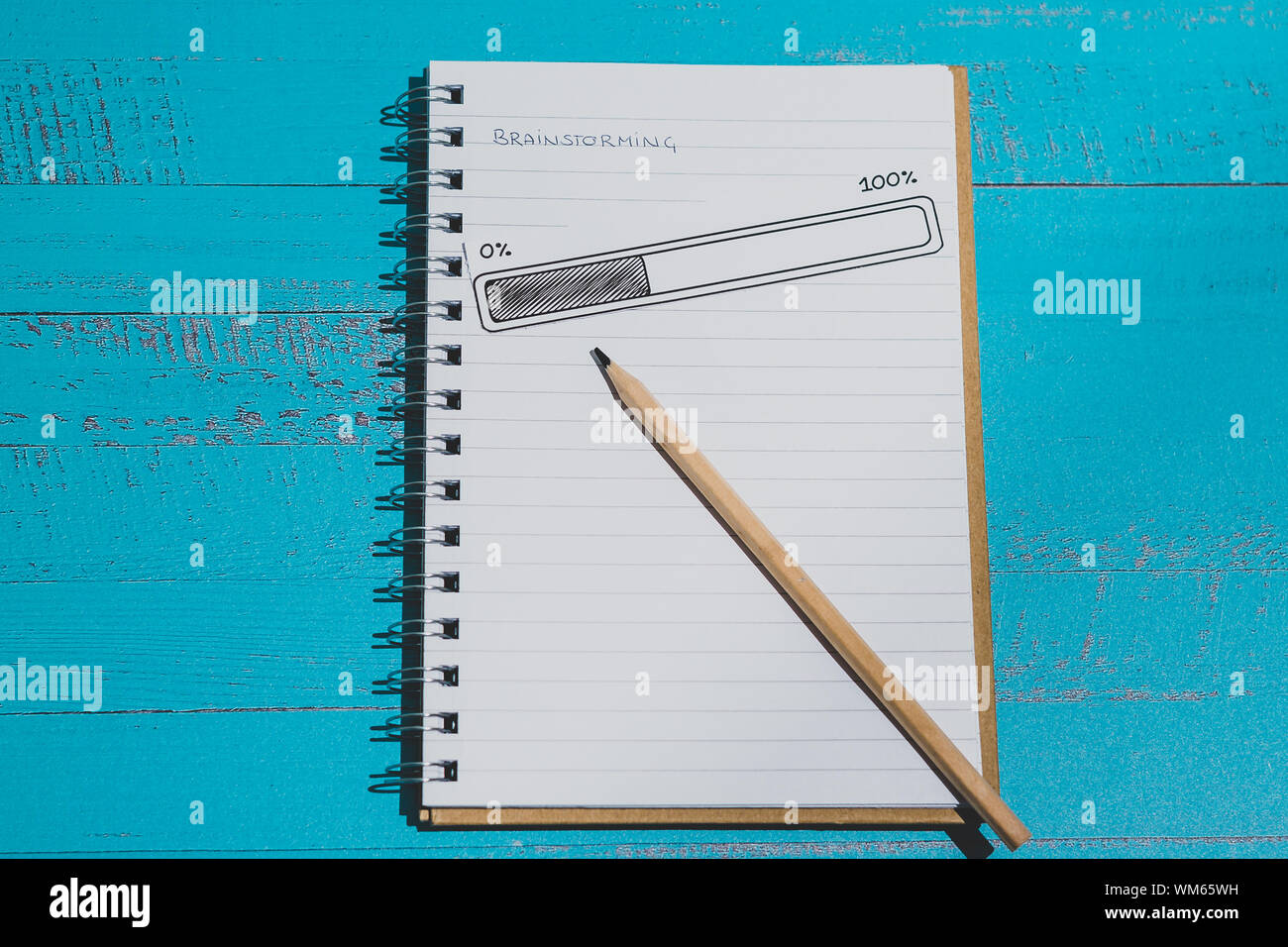 notebook with Brainstorming title on page and progress bar loading ...