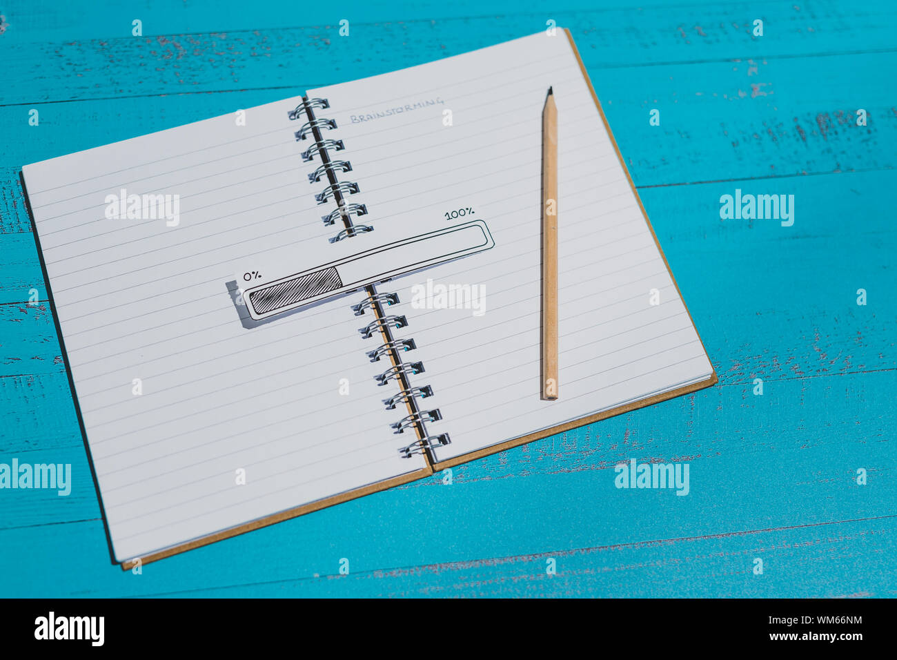 notebook with Brainstorming title on page and progress bar loading ...