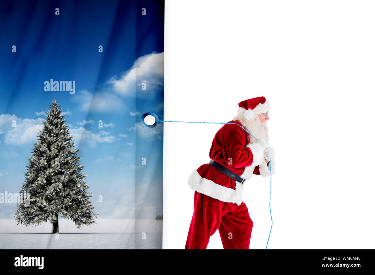 Santa claus pulling rope against white curtain blind Stock Photo - Alamy