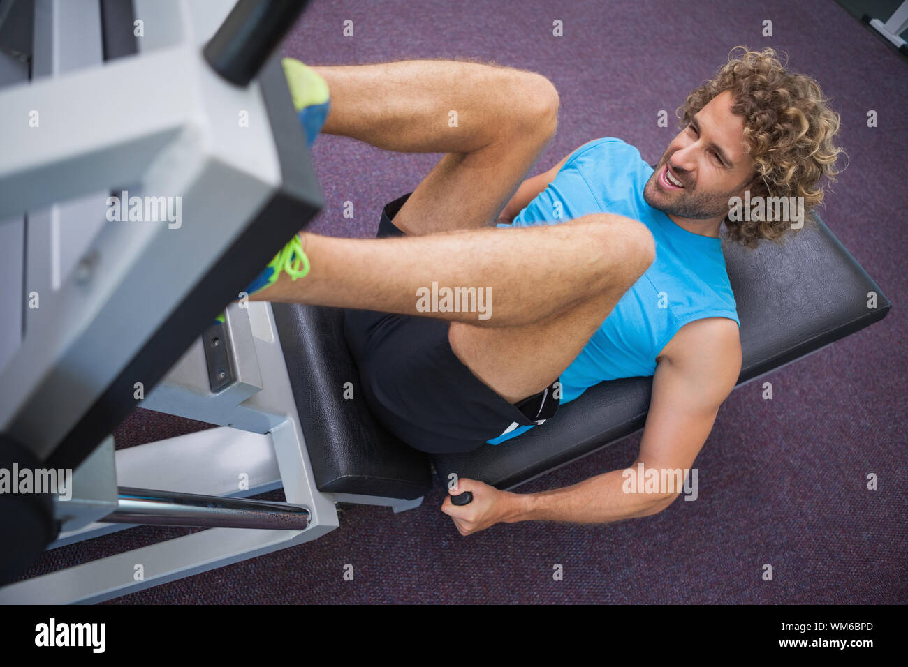 Young male leg press hi-res stock photography and images - Alamy