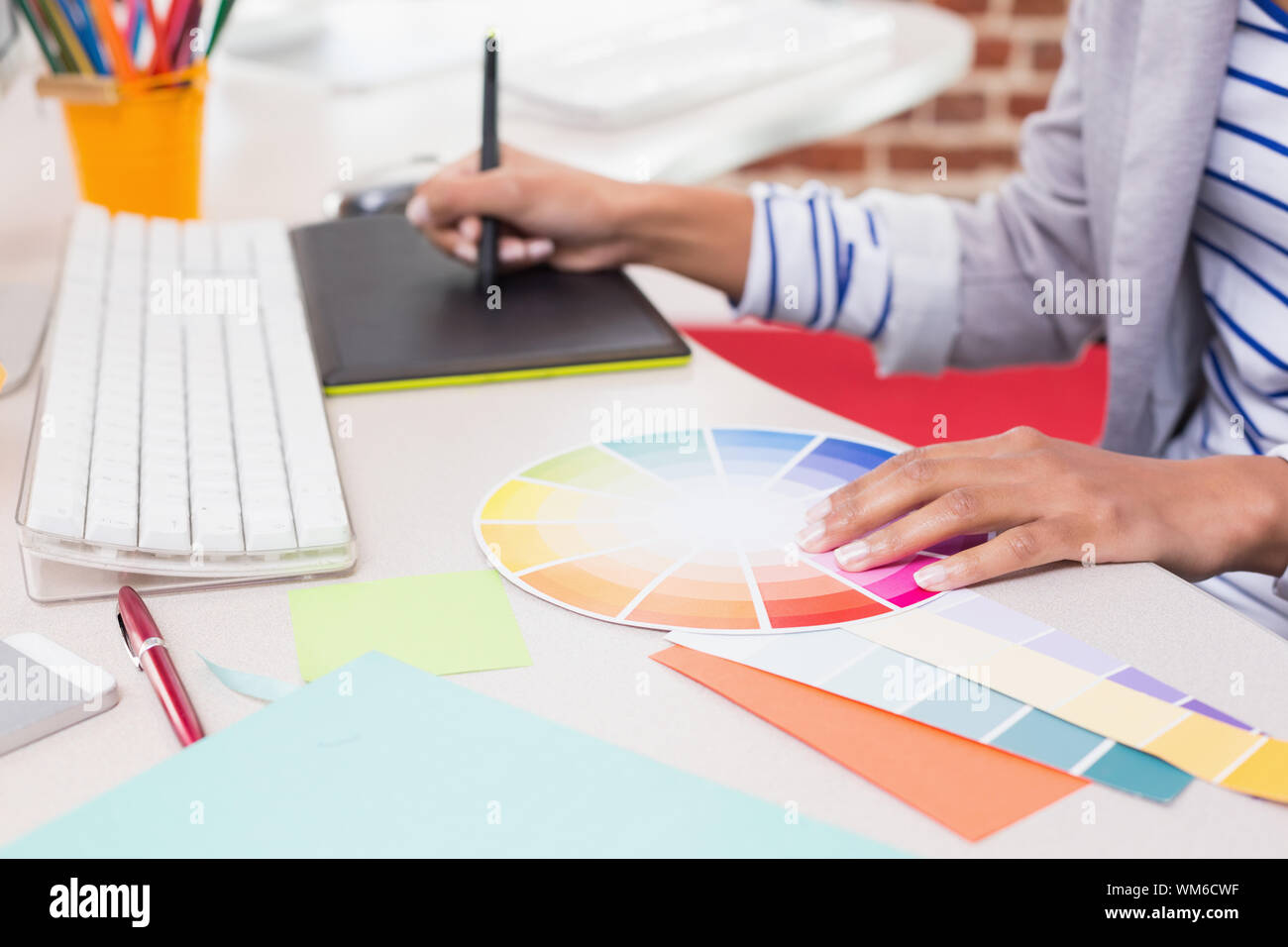 Close up side view of hand using digitizer in the office Stock Photo ...