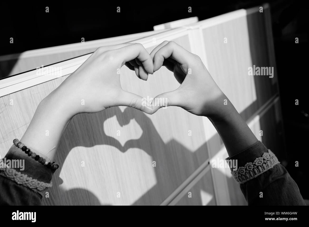 Heart Shape Hands Shadow On High Resolution Stock Photography and ...