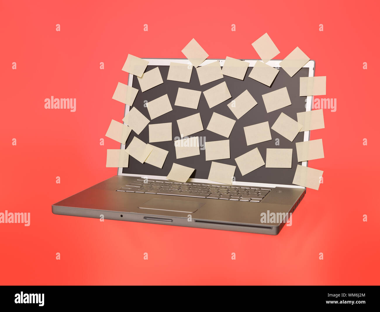 Grey laptop overflowed with empty post-its isolated Stock Photo - Alamy