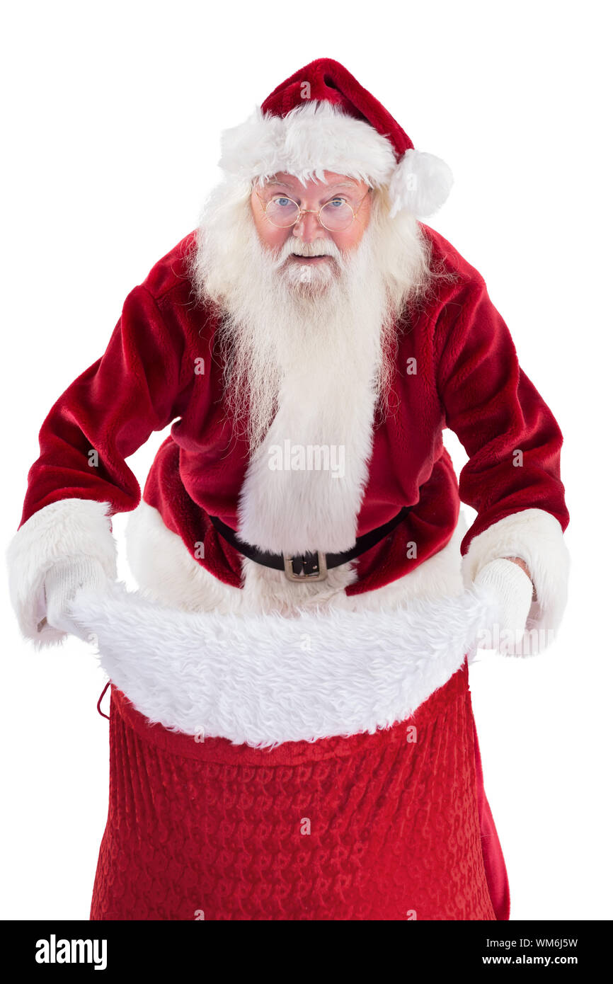 Santa open his red bag on white background Stock Photo - Alamy