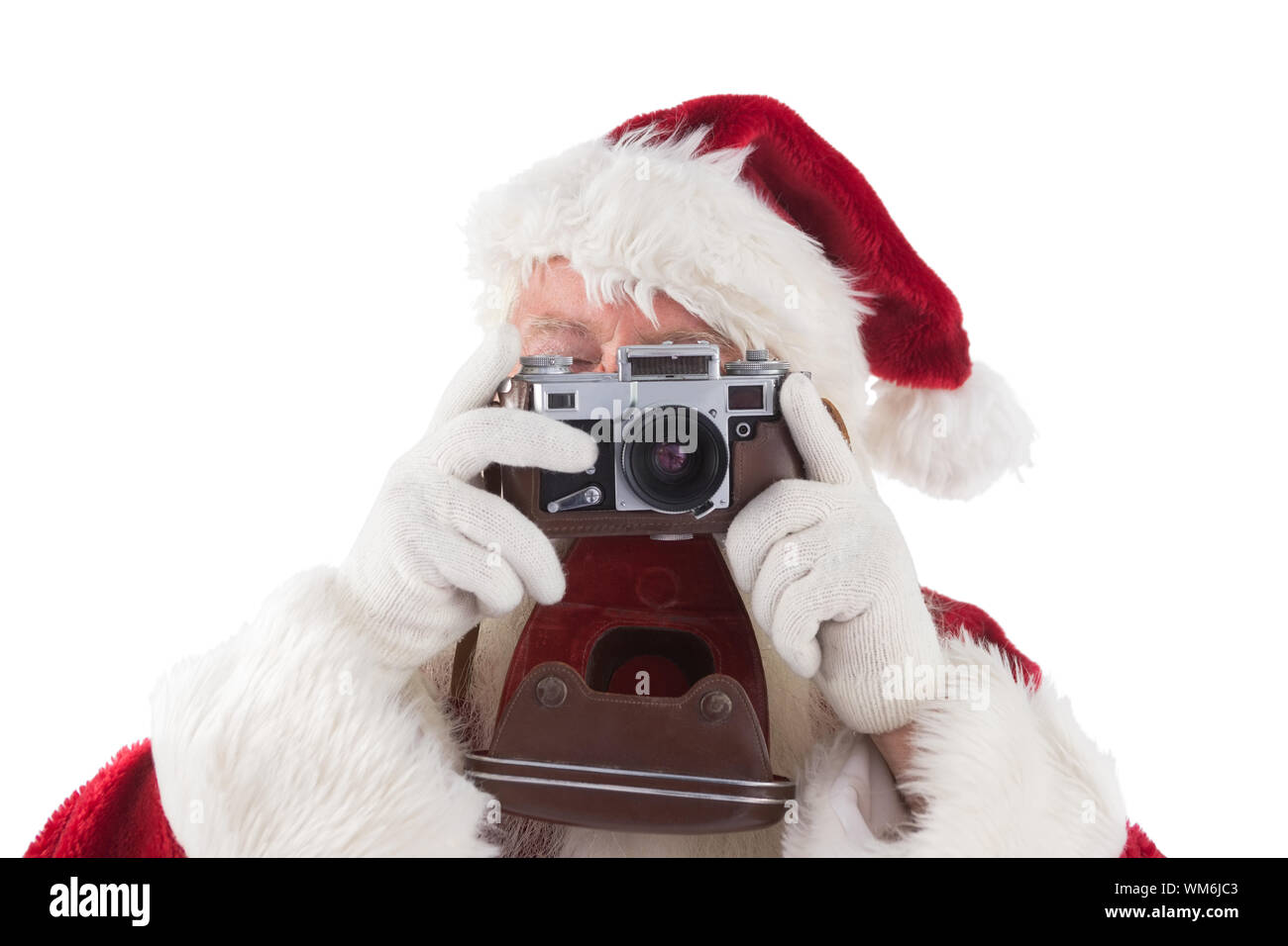 Santa is taking a picture on white background Stock Photo - Alamy