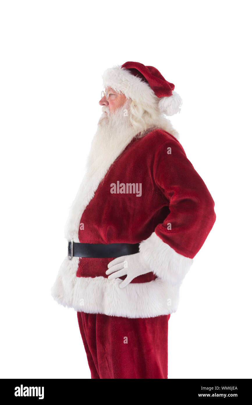 Santa Claus shows his side to camera on white background Stock Photo ...