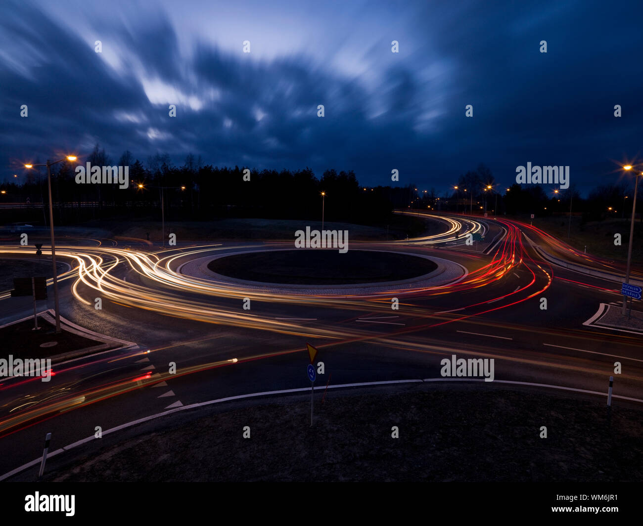 Traffic roundabout shot with long exposure time at night time Stock ...