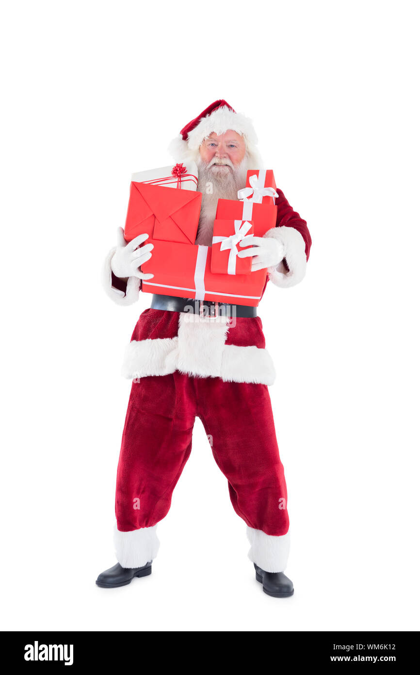 Santa carries a few presents on white background Stock Photo - Alamy