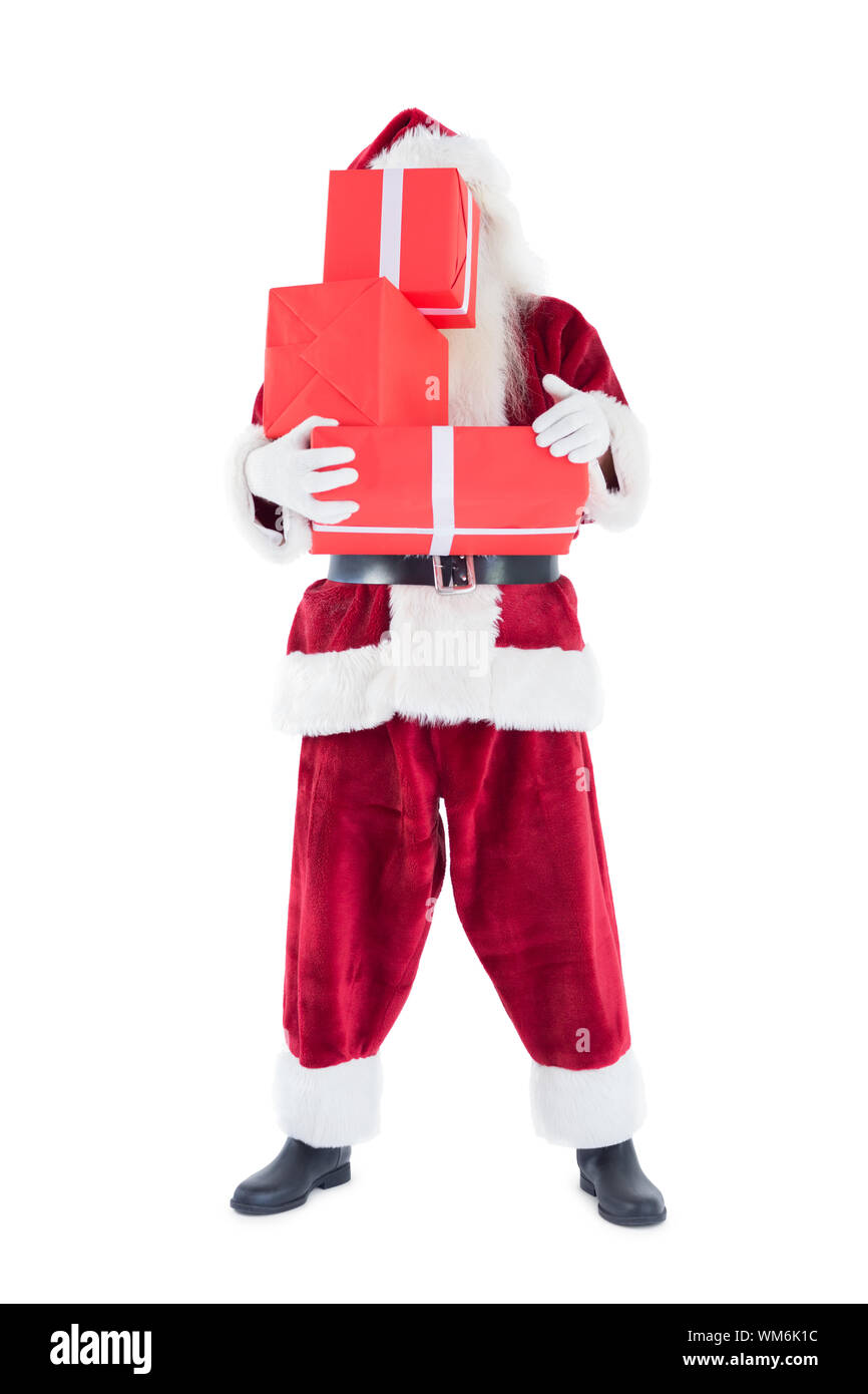 Santa covers his face with presents Stock Photo - Alamy