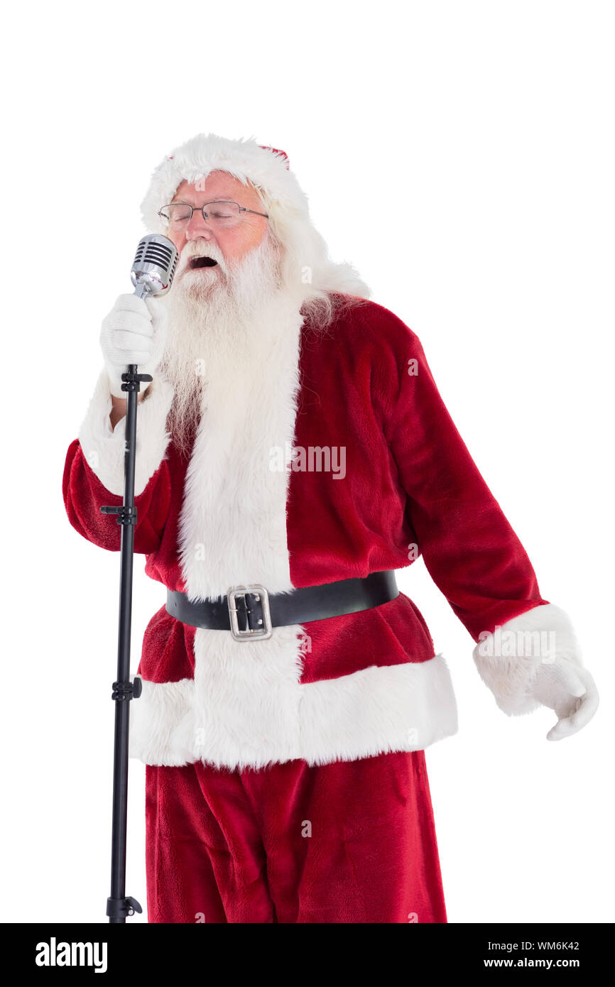 Santa sings like a Superstar on white background Stock Photo - Alamy