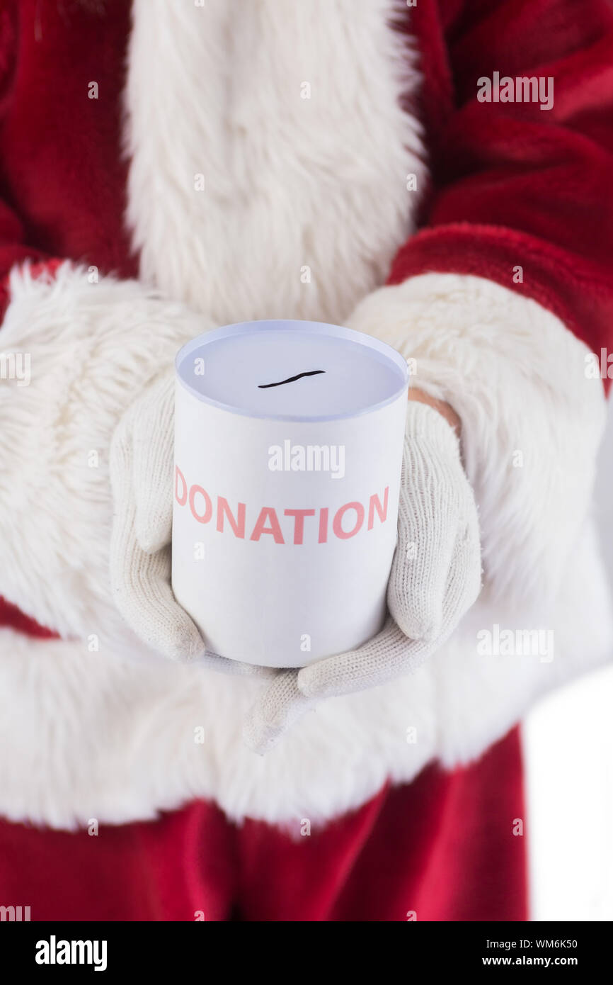 Santa holds a can for donations on white background Stock Photo - Alamy