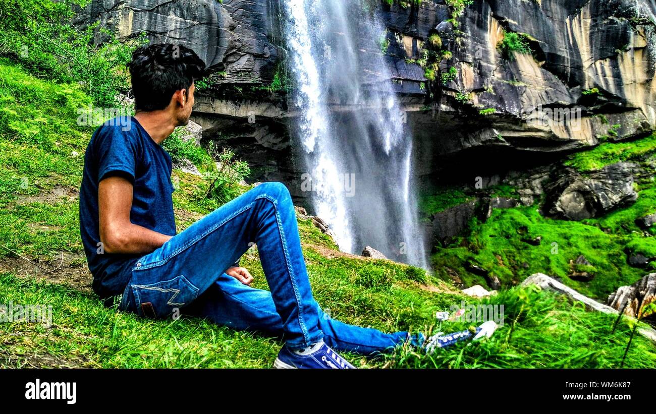 Sitting Man Looking Waterfall High Resolution Stock Photography and ...