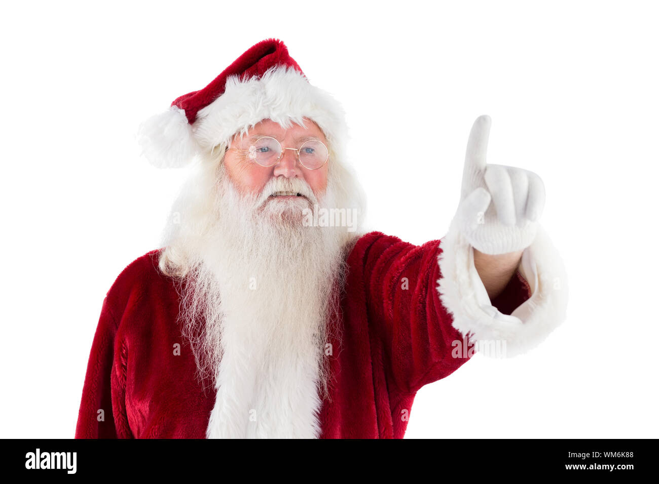 Santa Claus points at something on white background Stock Photo - Alamy