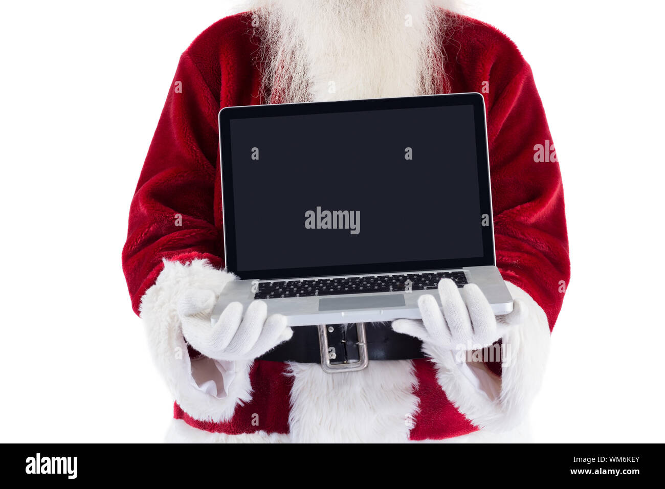 Santa Claus presents a laptop on white background Stock Photo - Alamy