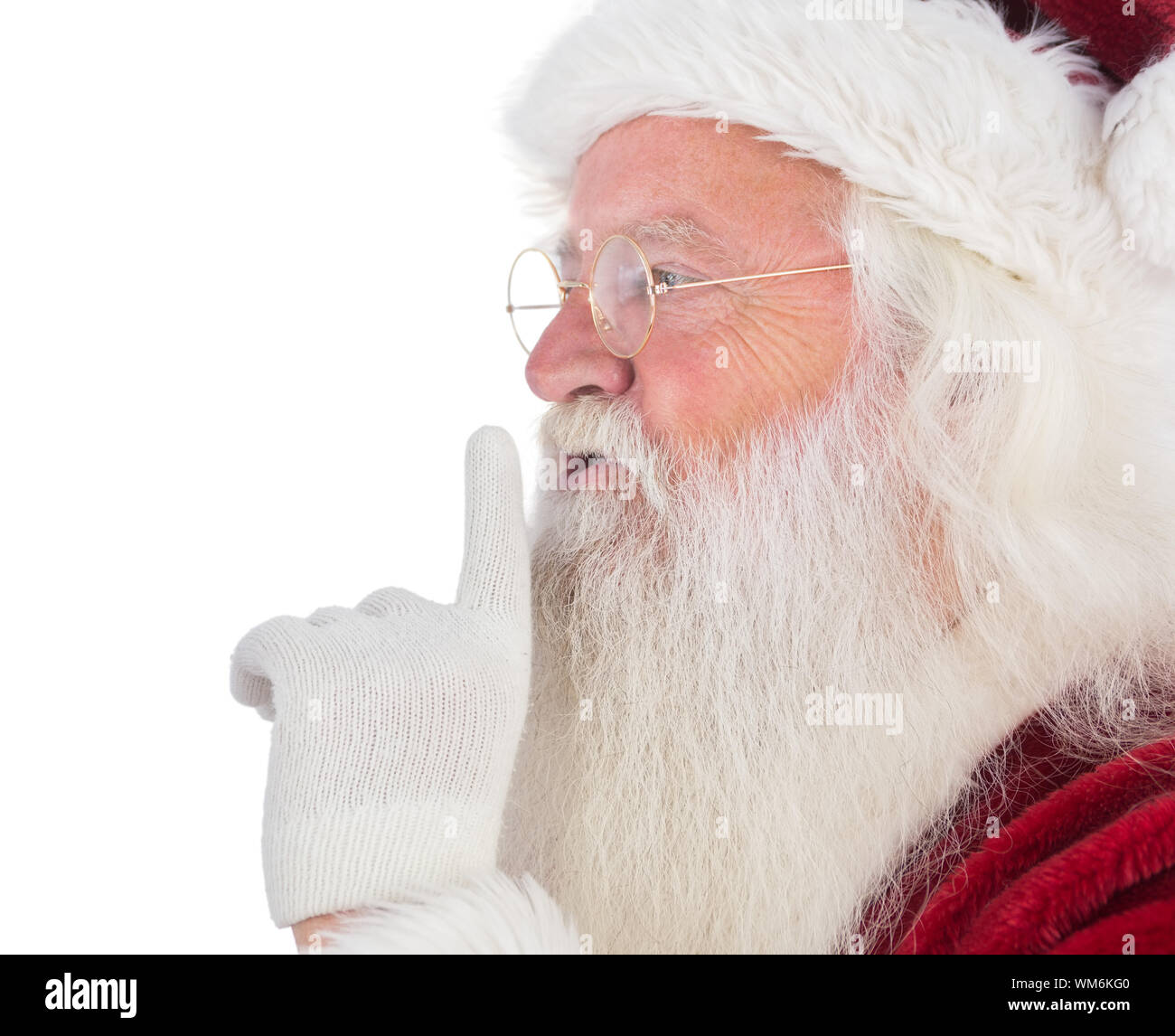 Santa Claus asking for quiet on white background Stock Photo - Alamy