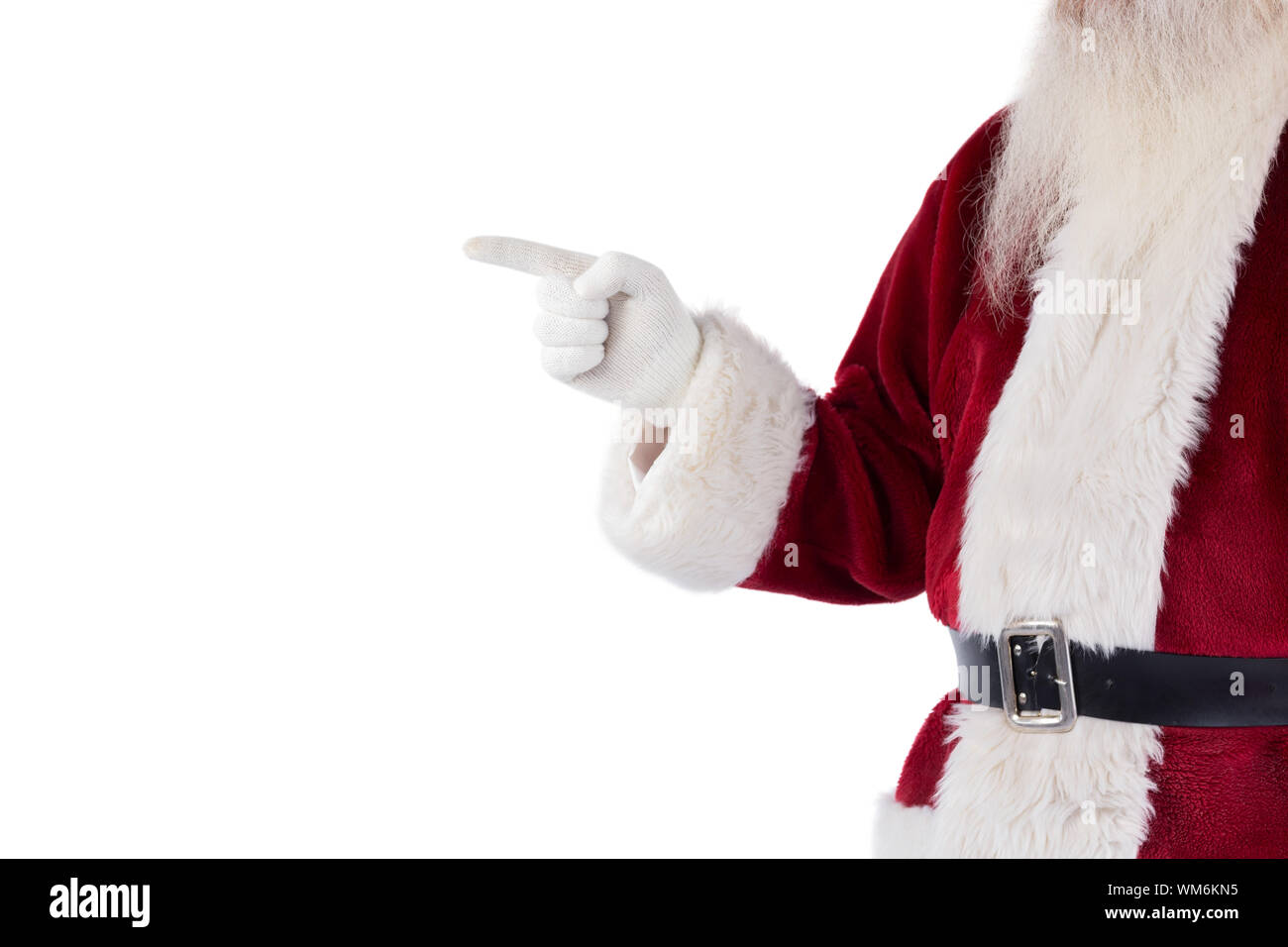 Santa Claus points at something on white background Stock Photo - Alamy