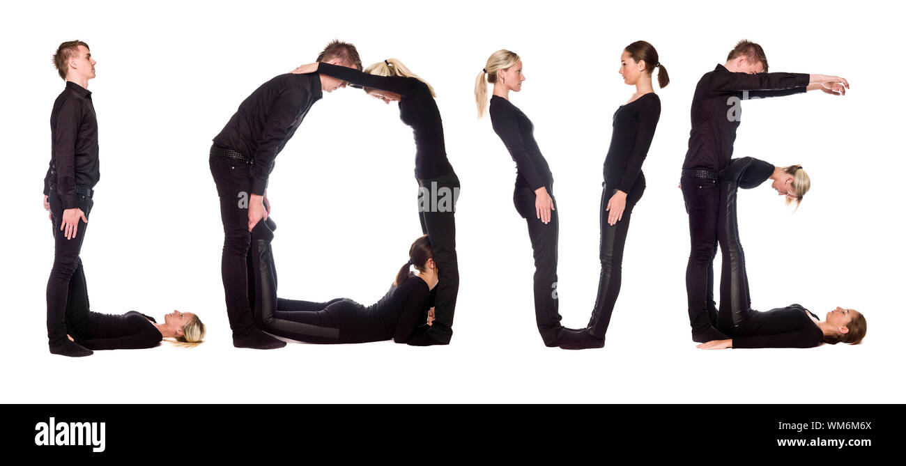 Group of people forming the word 'LOVE', isolated on white background ...