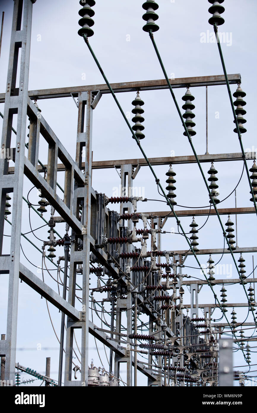 Power station with pylons and power lines Stock Photo - Alamy