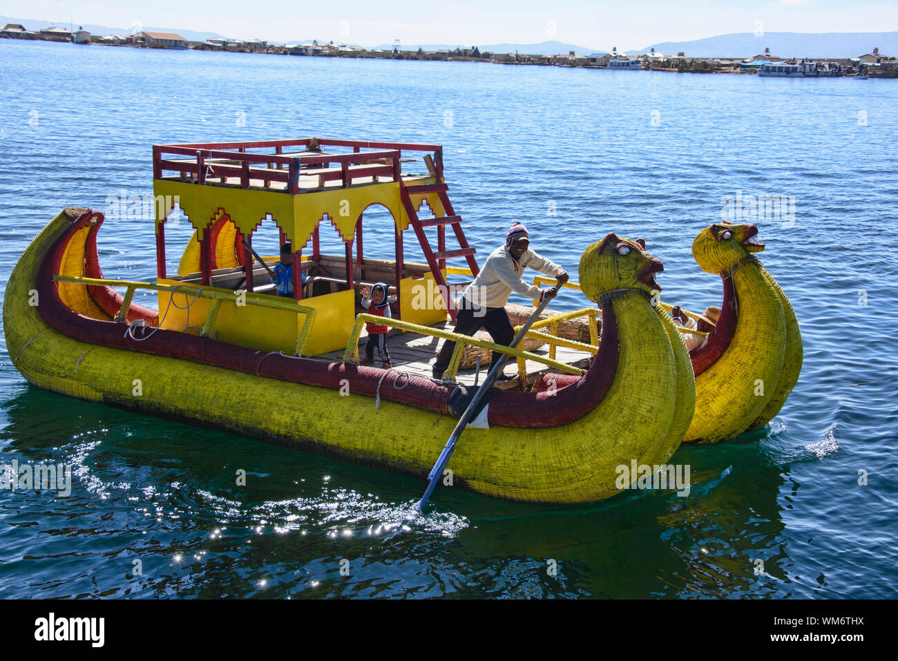 Traditional reed boat of the Uros islands, Lake Titicaca, Puno, Peru ...