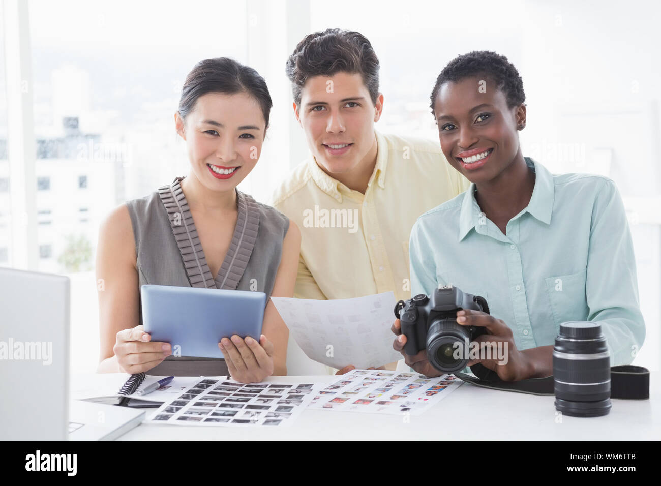 Group photo editors working hi-res stock photography and images - Alamy