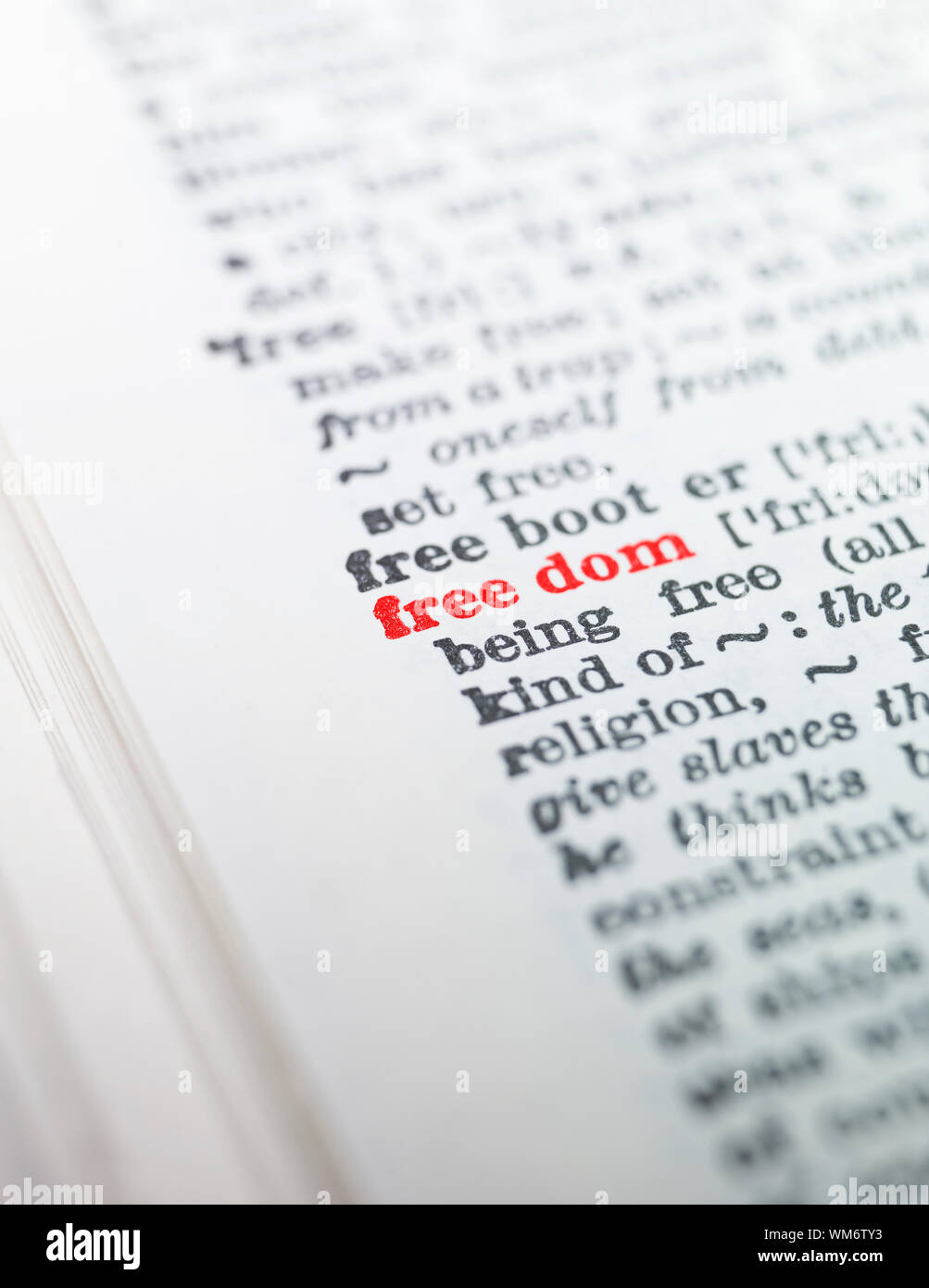 The word 'freedom' highlighted in a dictionary Stock Photo - Alamy