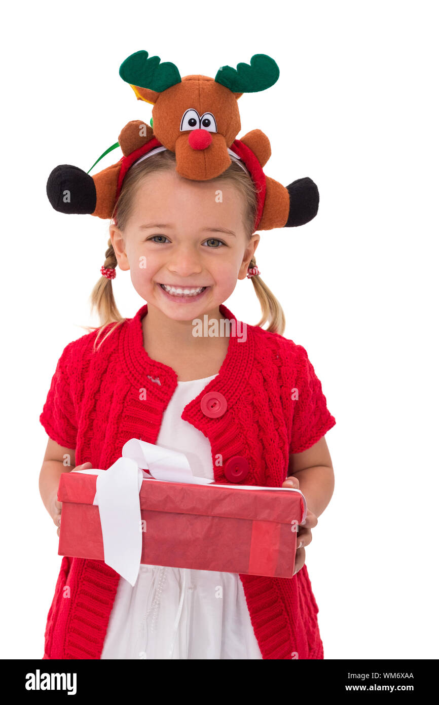 Cute little girl wearing rudolph headband on white background Stock ...